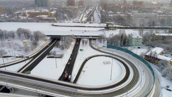 Aerial View of a Freeway Intersection Snow-covered in Winter, Stock Footage