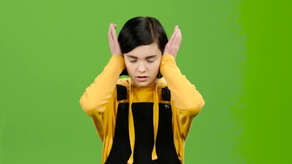 Girl Closes Her Ears with Her Hands. Green Screen, Stock Footage ...