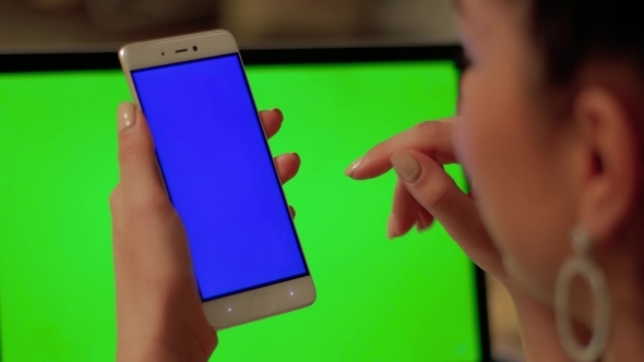 Girl Makes Video Call on Phone with Blue Screen, Stock Footage | VideoHive