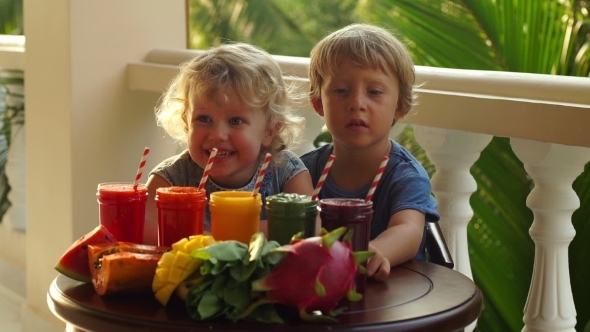 Children Ready To Drink Colorfull Fruit Shakes They Choose Which To ...