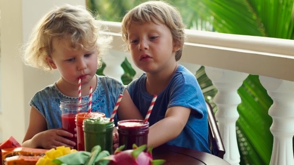 Children Drink Colorfull Fruit Shakes Boy Chooses Which To Drink Next ...