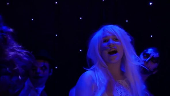 Albino Girl Singing and Dancing in Colorful Lights on Stage, Stock Footage