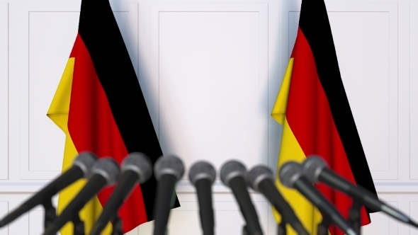 German Official Press Conference Featuring Flags of Germany, Motion ...