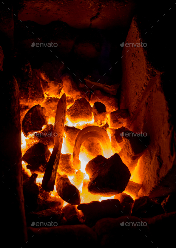 Blazing furnace at the blacksmith's Stock Photo by alexbowmore | PhotoDune