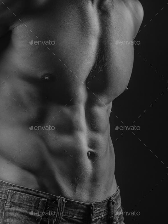 Abdominal muscles of a fit young man Stock Photo by alexbowmore | PhotoDune