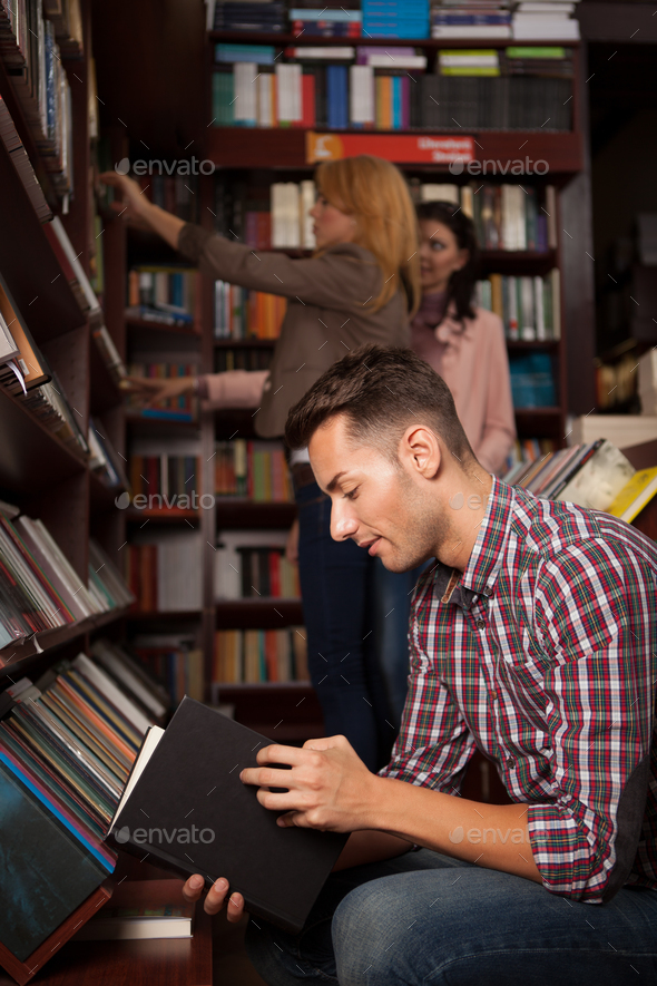handsome man reading a book Stock Photo by shotsstudio | PhotoDune