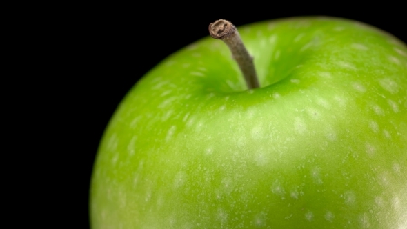 Beautiful, Green Apple Spinning on Black Background, Stock Footage