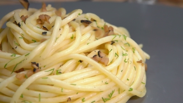 Small Cubes of Black Truffle Falling on Spaghetti, Stock Footage ...