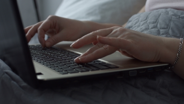 Female Hands Typing on Laptop Keyboard in the Bed, Stock Footage ...