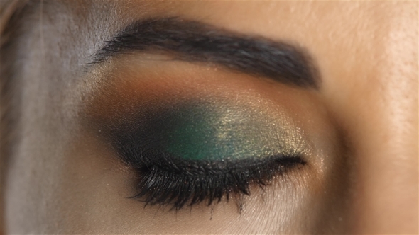 Girl with Makeup Opens Eyes and Looks, Stock Footage | VideoHive