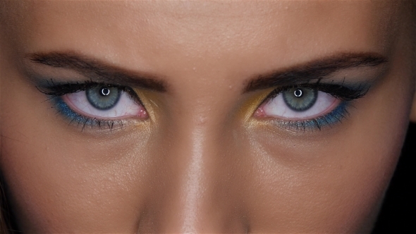 Girl Looks Fierce and Terrible Gaze Upwards, Stock Footage | VideoHive