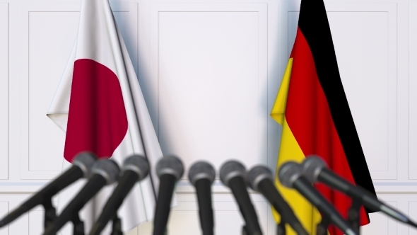 Flags of Japan and Germany at International Press Conference, Motion ...