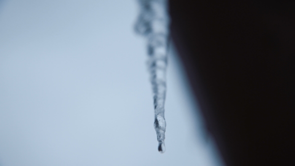 Long Sharp Icicle Hanging on Roof, Stock Footage | VideoHive