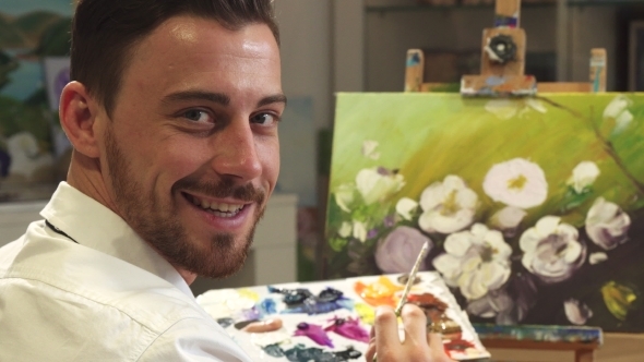 Male Artist Working on a Painting at His Art Studio, Stock Footage