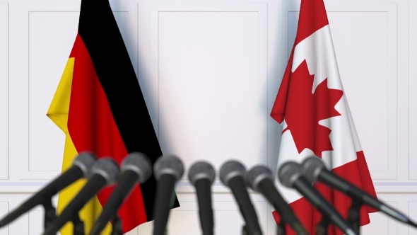 Flags of Germany and Canada at International Press Conference, Motion ...