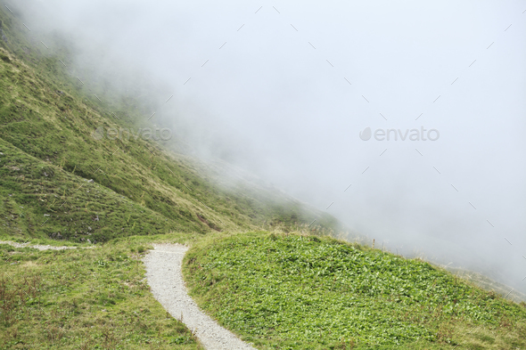 path in mountains into fog Stock Photo by catolla | PhotoDune