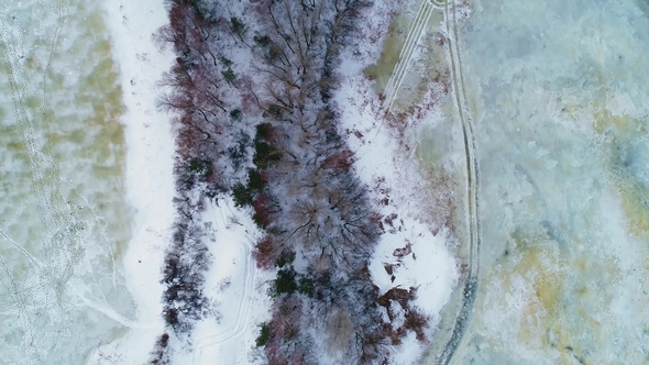 Aerial Drone Footage. Top View Island on Frozen Lake, Stock Footage