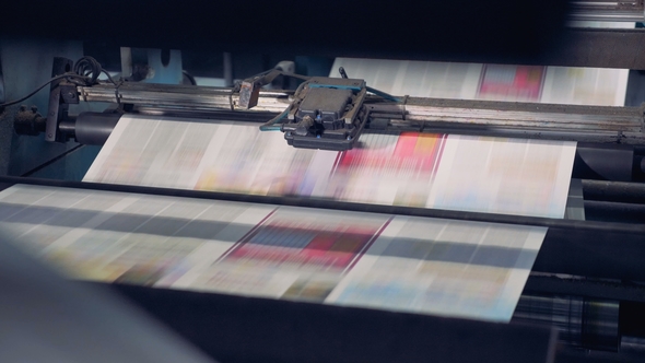 Uncut Printed Paper Sheets Are Being Processed By Industrial Equipment ...