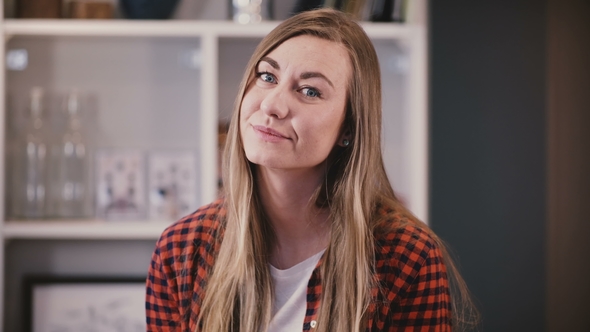 Pretty Girl Looks at Camera Nodding and Smiling. Positive Answer ...