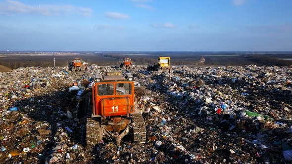 City Dump - The Bulldozer Compacts the Garbage on the Landfill, Stock ...
