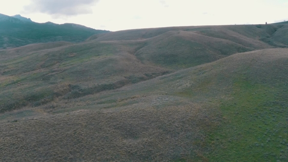 Fly Over the Hills and Ravine to Horizon, Stock Footage | VideoHive