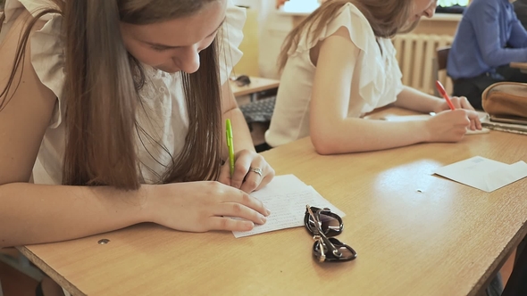 Russian School. Pupils Write a Control Exam in Their Notebooks., Stock ...