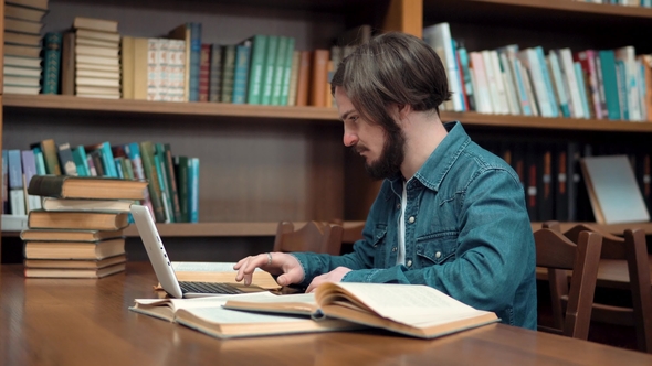 Hard-working Student in Library, Stock Footage | VideoHive