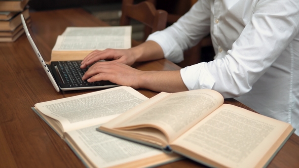 Man Typing While Reading, Stock Footage | VideoHive