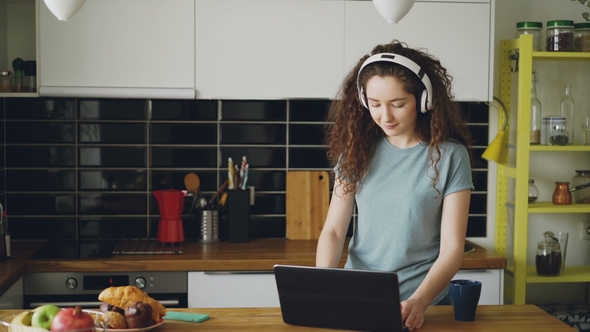 Funny Beautiful Woman Dancing Near Table Printing on Laptop, Her ...