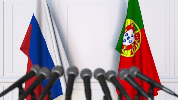 Flags of Russia and Portugal at International Press Conference, Motion ...