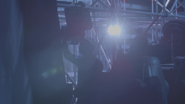 Technical Preparation for the Big Concert Indoors. Workers Prepare the ...