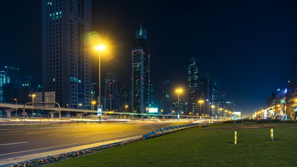 Car Traffic on Sheikh Zayed Road at Night in Downtown, Skyscrapers with ...