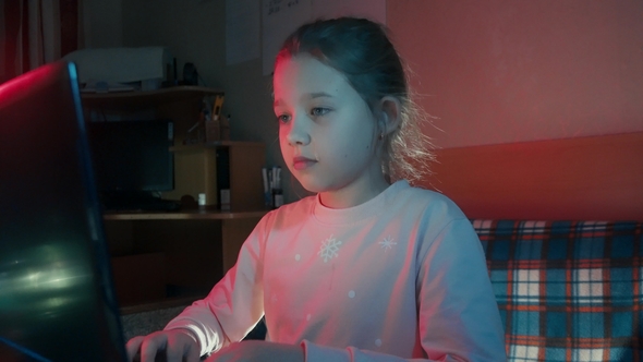 Little Girl Sitting at the Computer Crying, Stock Footage | VideoHive