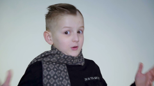 Surprised Young Boy Complainting and Arguing at Camera, Stock Footage