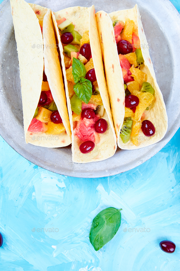Fruit tacos. Summer snacks. Stock Photo by bondarillia | PhotoDune