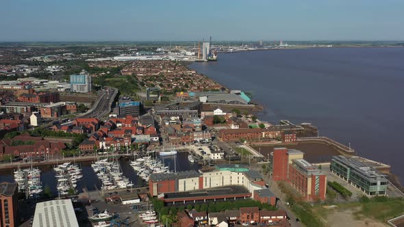 Sunny slow aerial pan from right to left to reveal Hull Marina and the ...