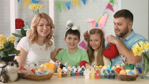 Portrait of Happy Friendly Family with Two Children During Easter ...