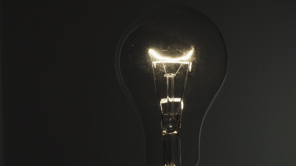Light Bulb on Black Background. Idea Light Bulb, Stock Footage | VideoHive