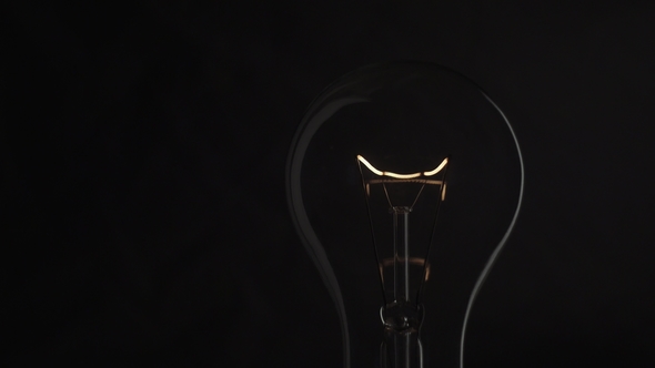 Light Bulb on Black Background. Idea Light Bulb, Stock Footage | VideoHive