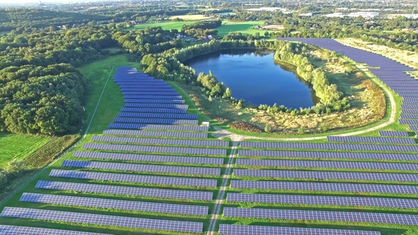 Aerial Shot of Solar Power Plant with Beautiful Lake, Stock Footage