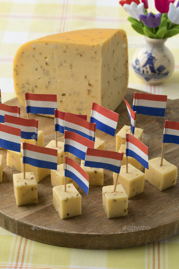 Pieces of traditional Dutch cumin cheese as a snack Stock Photo by ...