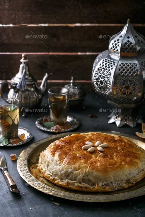Moroccan chicken bastilla on copper plate, close view Stock Photo by ...