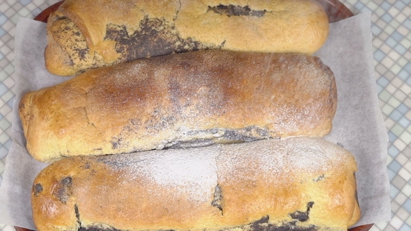 Sugar Powder Fills on Baked Rolls with Poppy Filling, Stock Footage