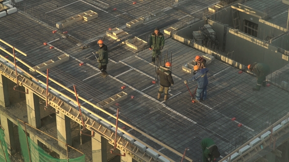 Workers Walk on the Construction Site, Stock Footage | VideoHive