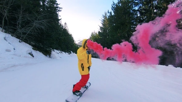 Snowboard Rider with Smoke Bomb on Mountain Slope, Stock Footage ...