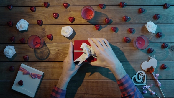 Disappointed Man Gets Sticky Note with Sad Face As Holiday Gift in Box ...