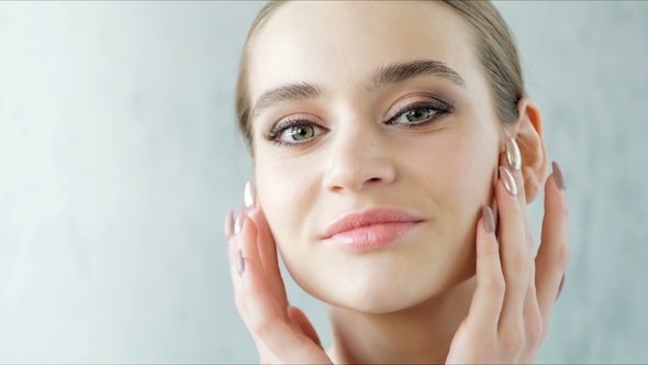 Beautiful Young Woman with Clean and Healthy Skin Posing on Grey ...