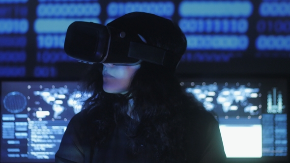 Woman Hacker Programmer Uses a Virtual Reality Helmet for Programming ...
