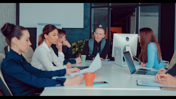 Business People Sitting at Desk in Office, Stock Footage | VideoHive