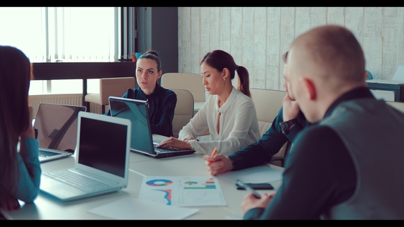 Business People Sitting at Desk in Office, Stock Footage | VideoHive